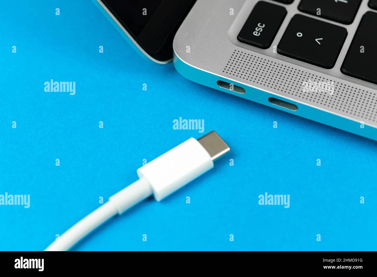 Charging laptop with modern USB Type C port. Laptop low battery concept ...