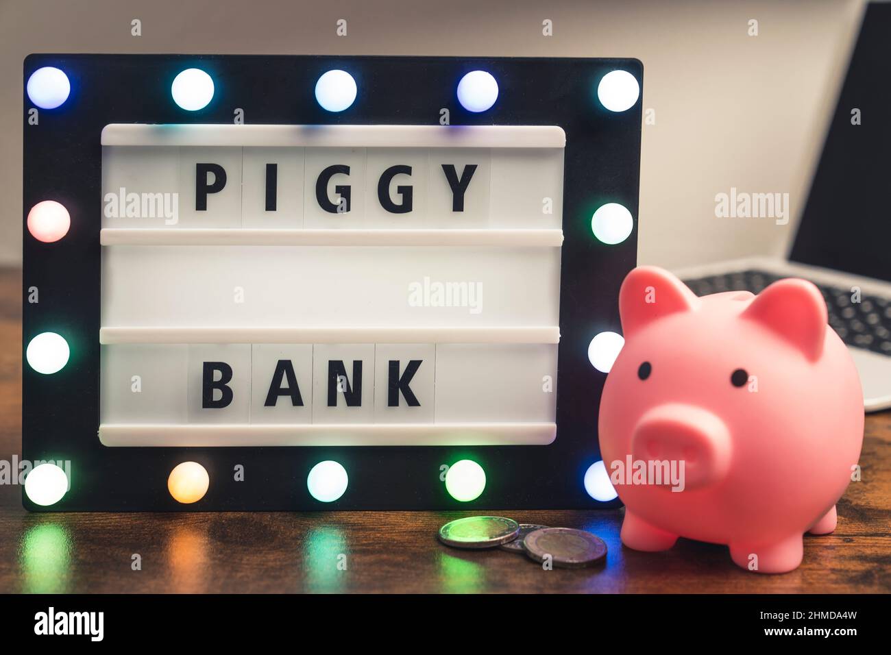 Piggy bank word written on marquee lightbox - savings concept. High ...