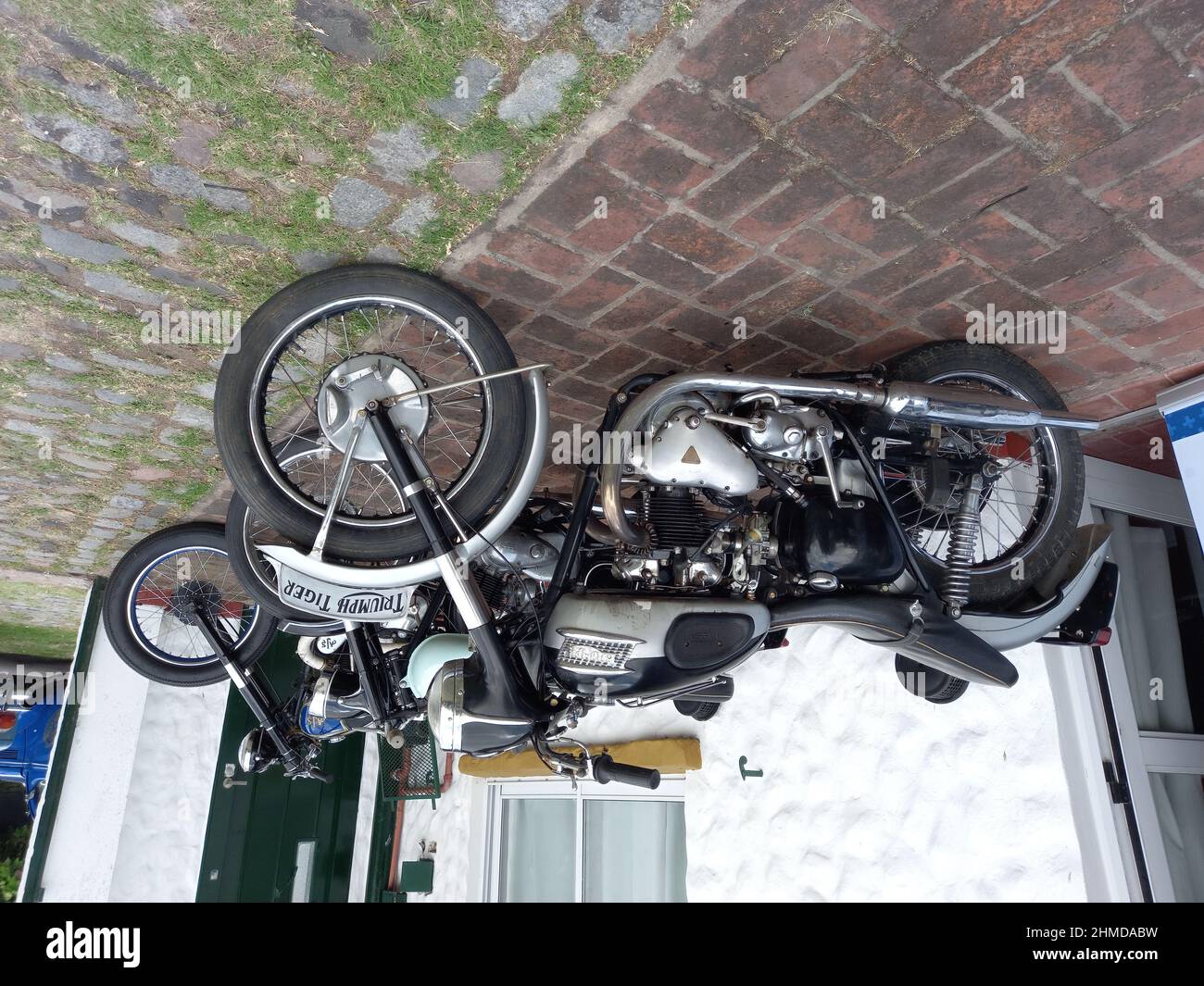 Side view of a British vintage sport motorcycle Triumph Tiger 100 ...