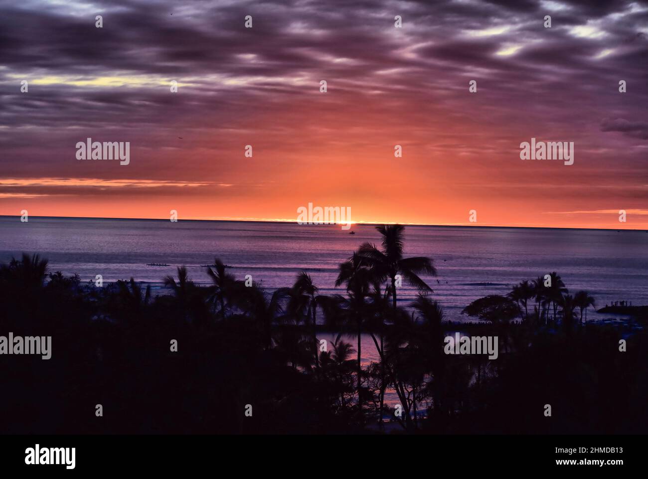Beautiful multi-color sunset over the Pacific Ocean in Waikiki, HI ...