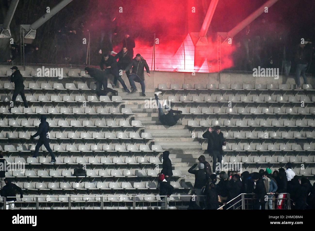Paris FC - Olympique Lyonnais A man falls down the stairs during the ...
