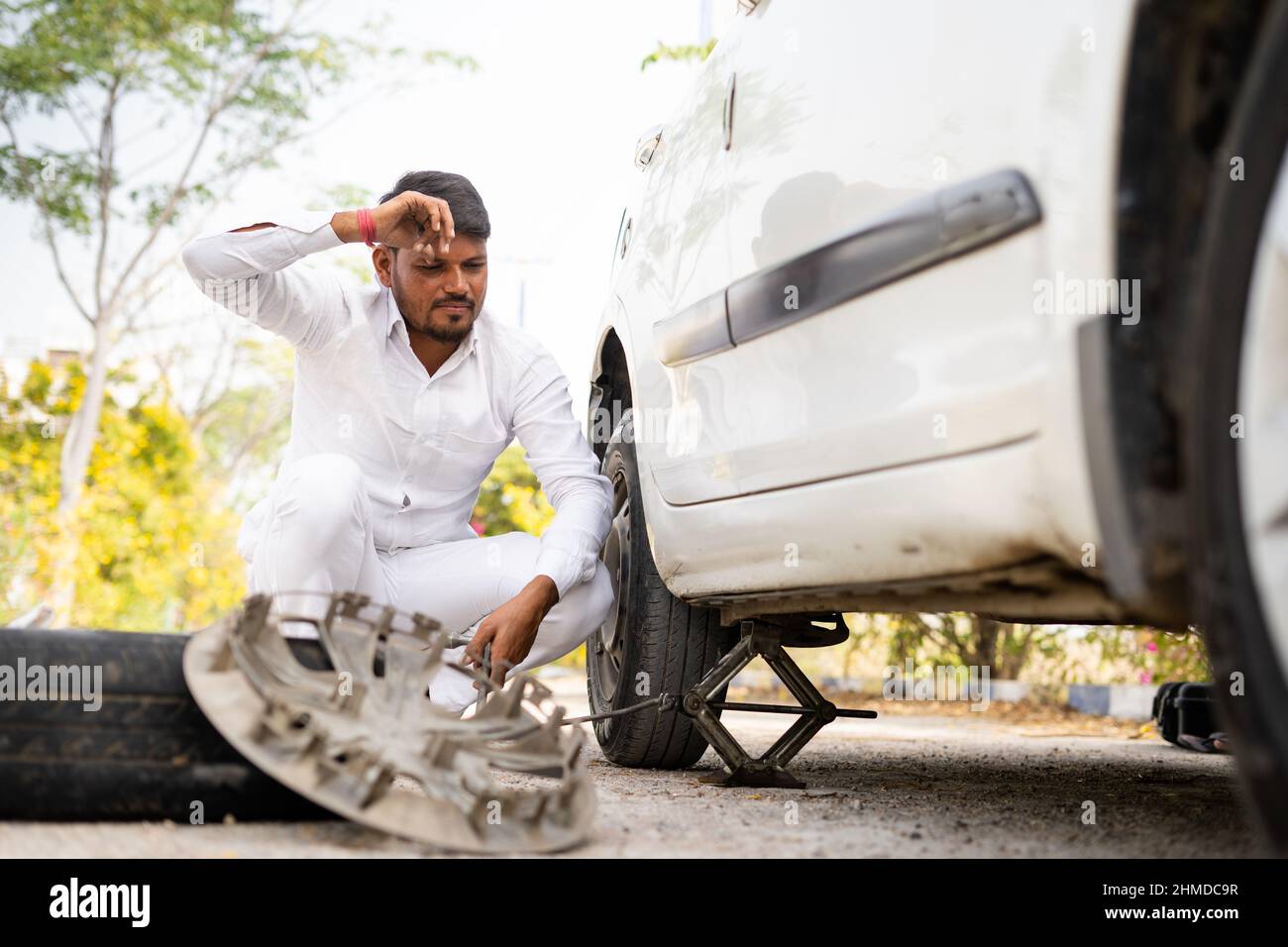 Car punctured hi-res stock photography and images - Alamy