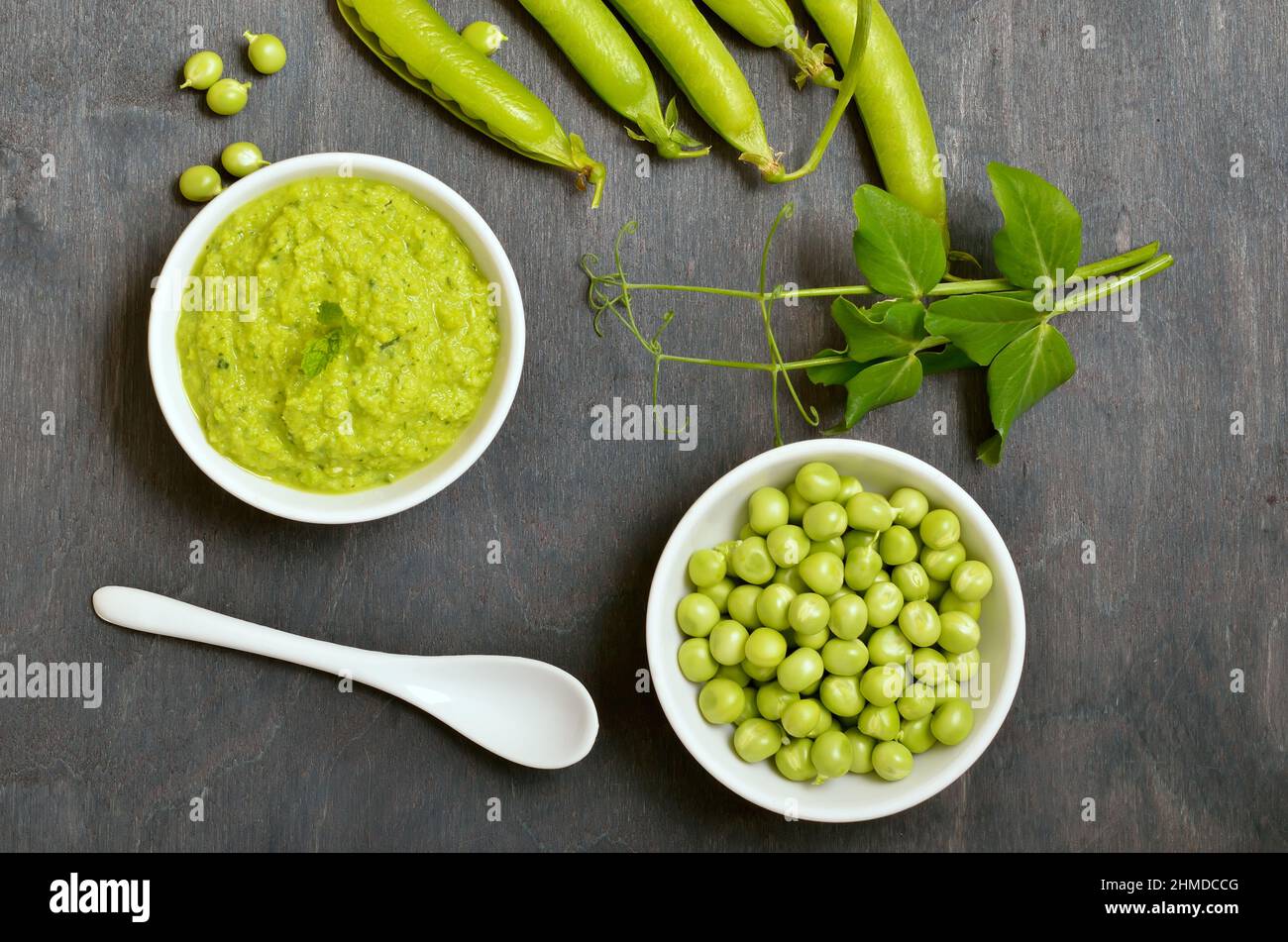 Fresh green peas in bowl and homemade green pea puree. Top view, flat ...
