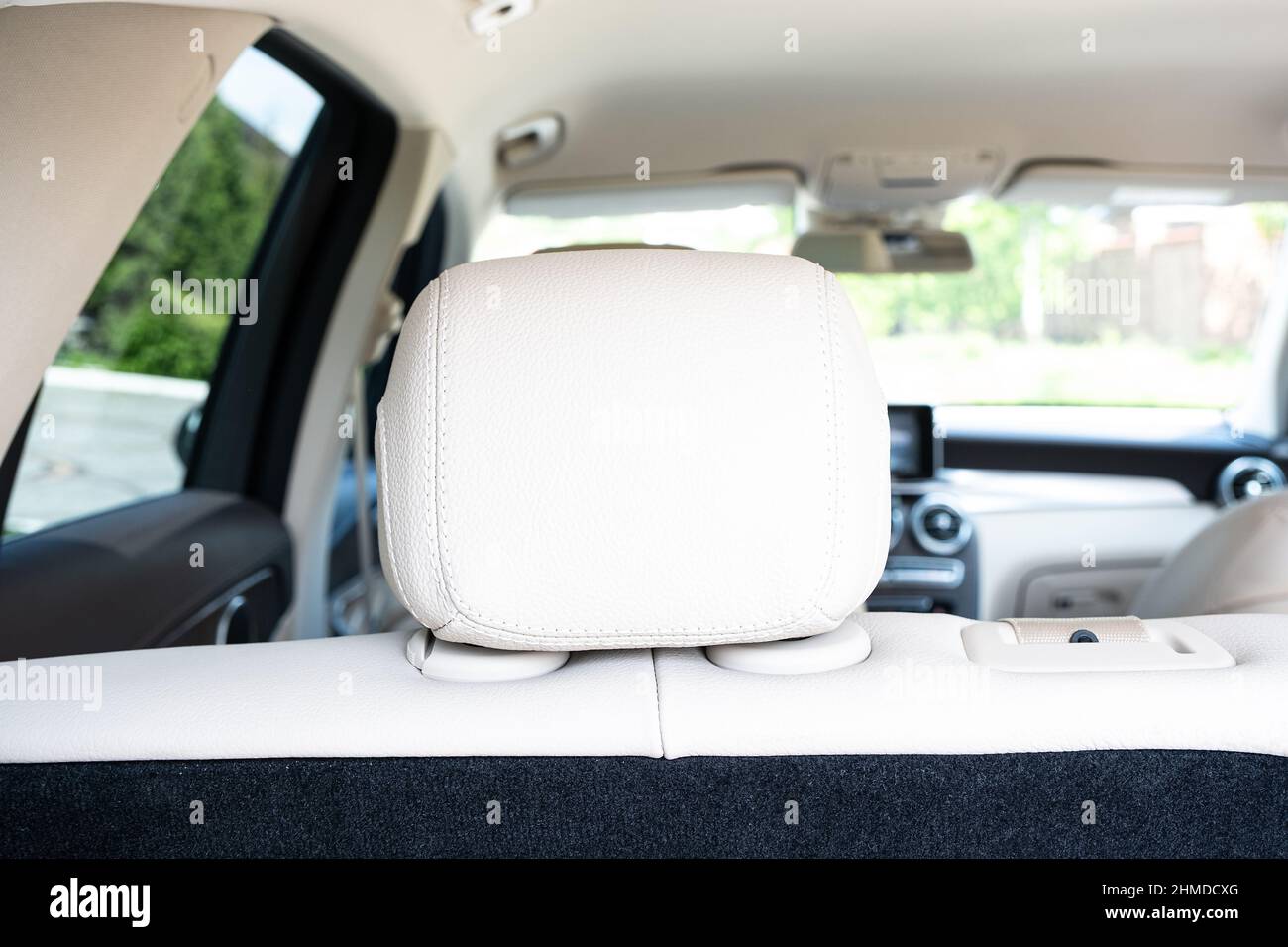 Headrest in modern luxury comfortable car with the beige perforated ...