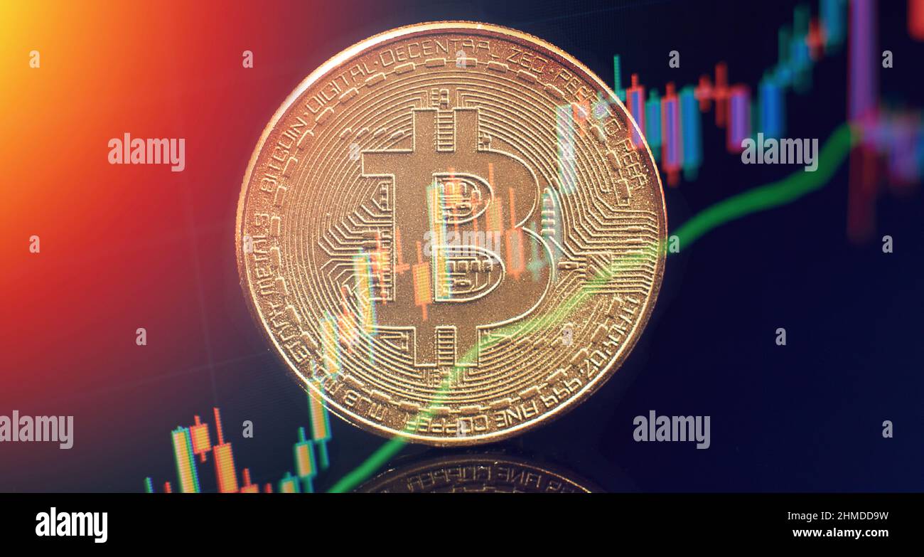 Gold bitcoins with Candle stick graph chart and digital background ...