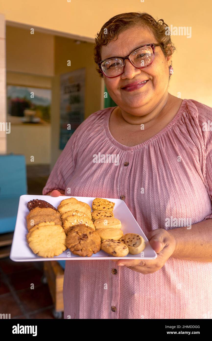 Hispanic boy with autism spectrum disorder looking at camera Stock ...