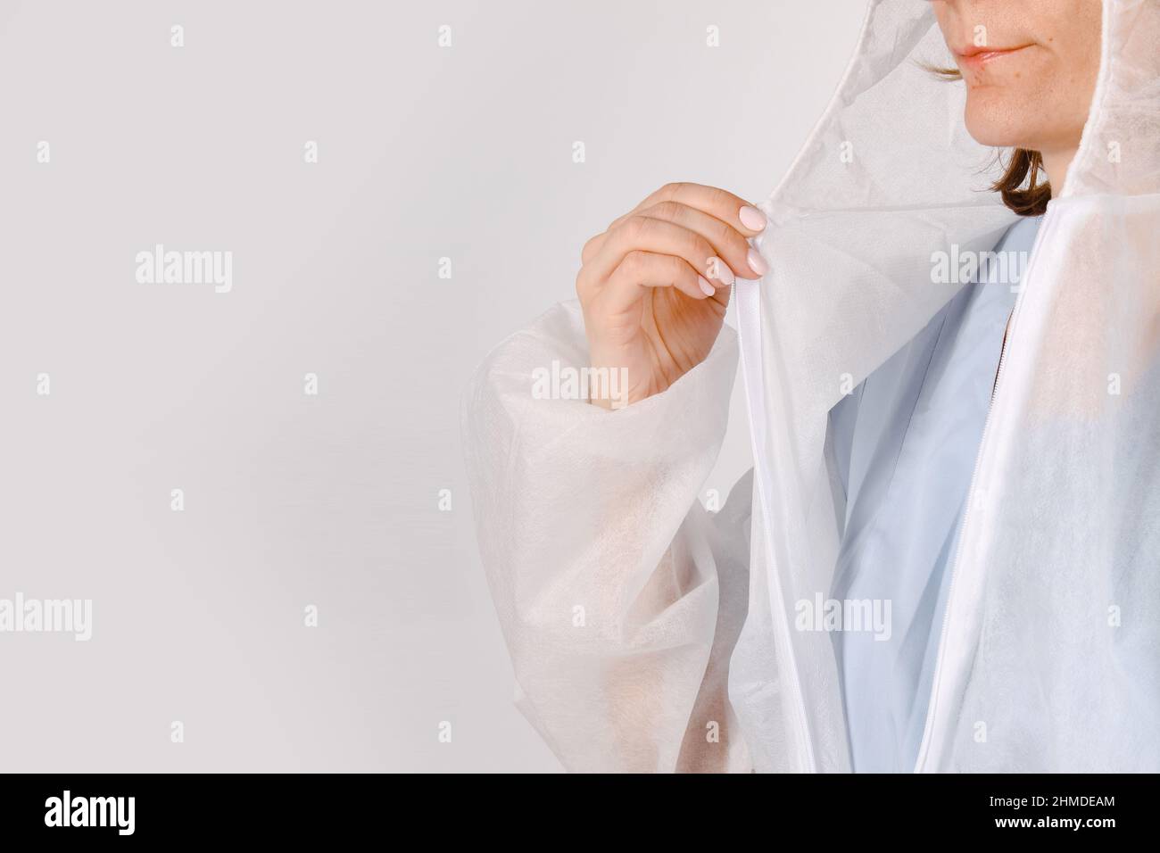 Female doctor wearing personal protective equipment in hospital ...