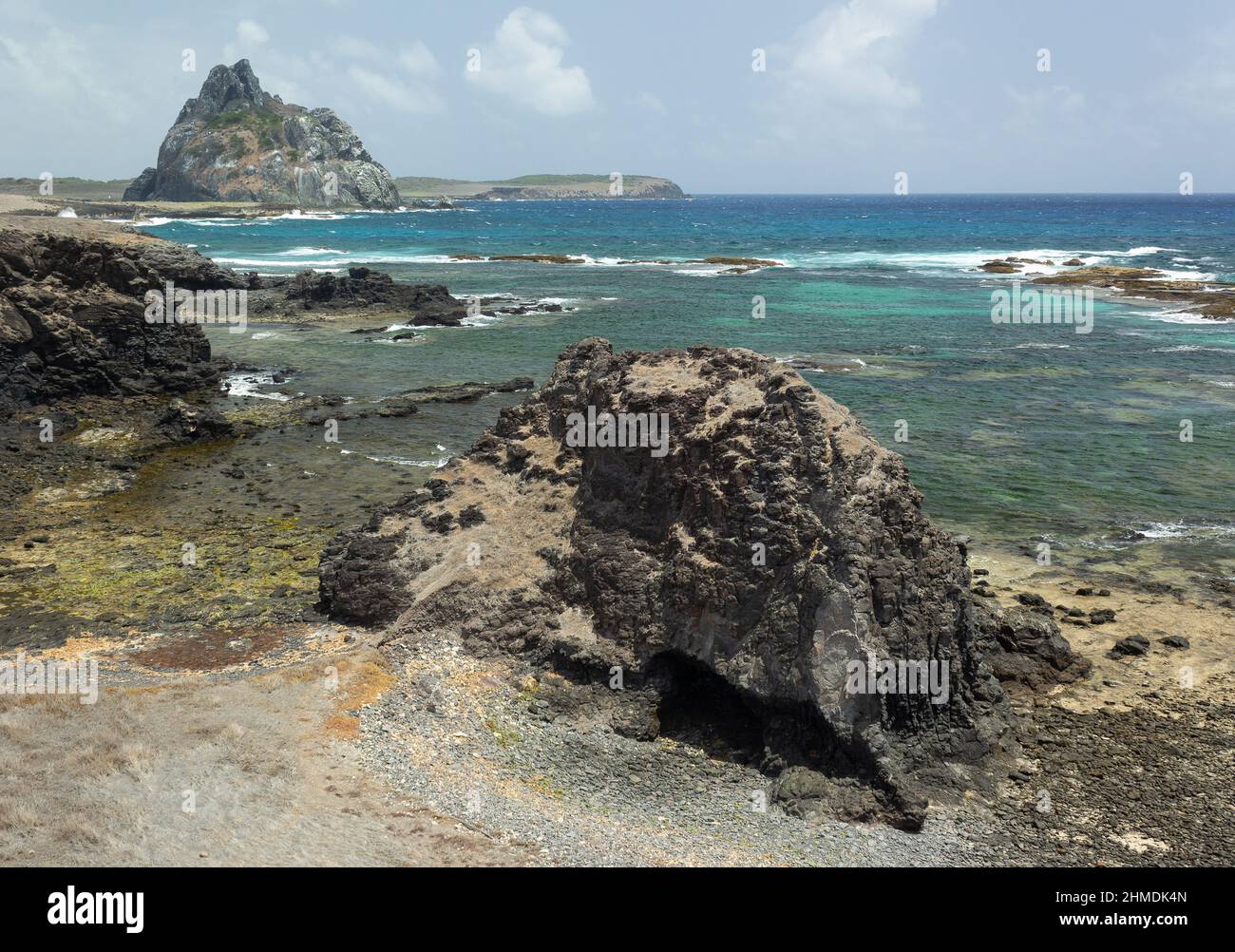 Blue and green water in a beach at Fernando de Noronha archipelago ...