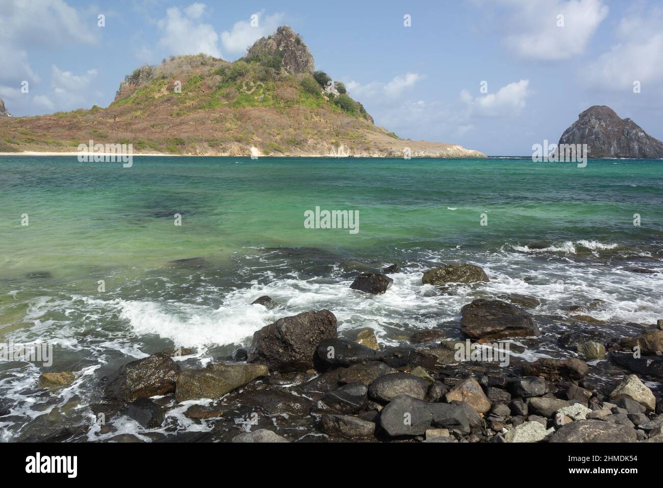Blue and green water in a beach at Fernando de Noronha archipelago ...