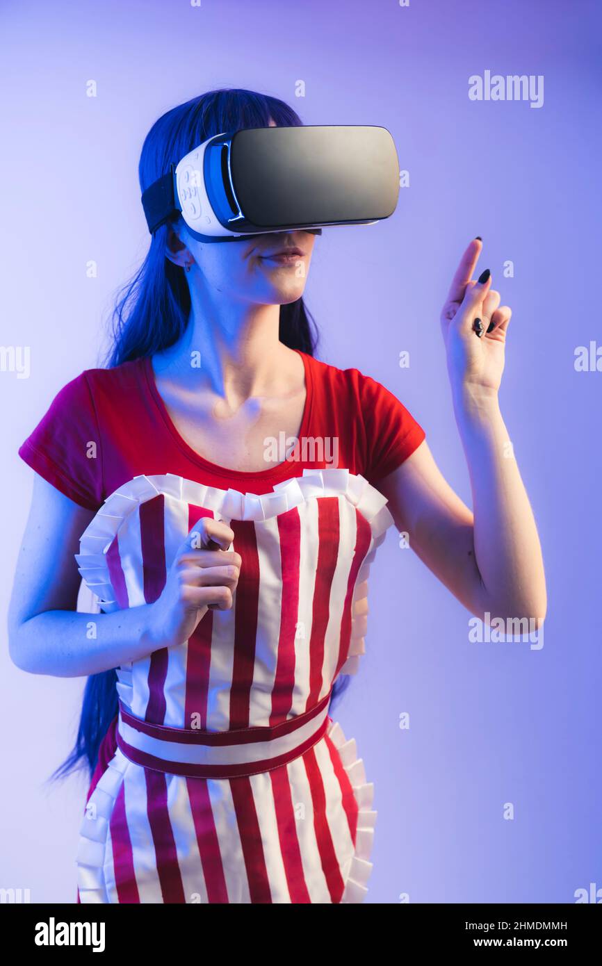 Attractive Waitress using VR headset goggles and virtual interface to ...