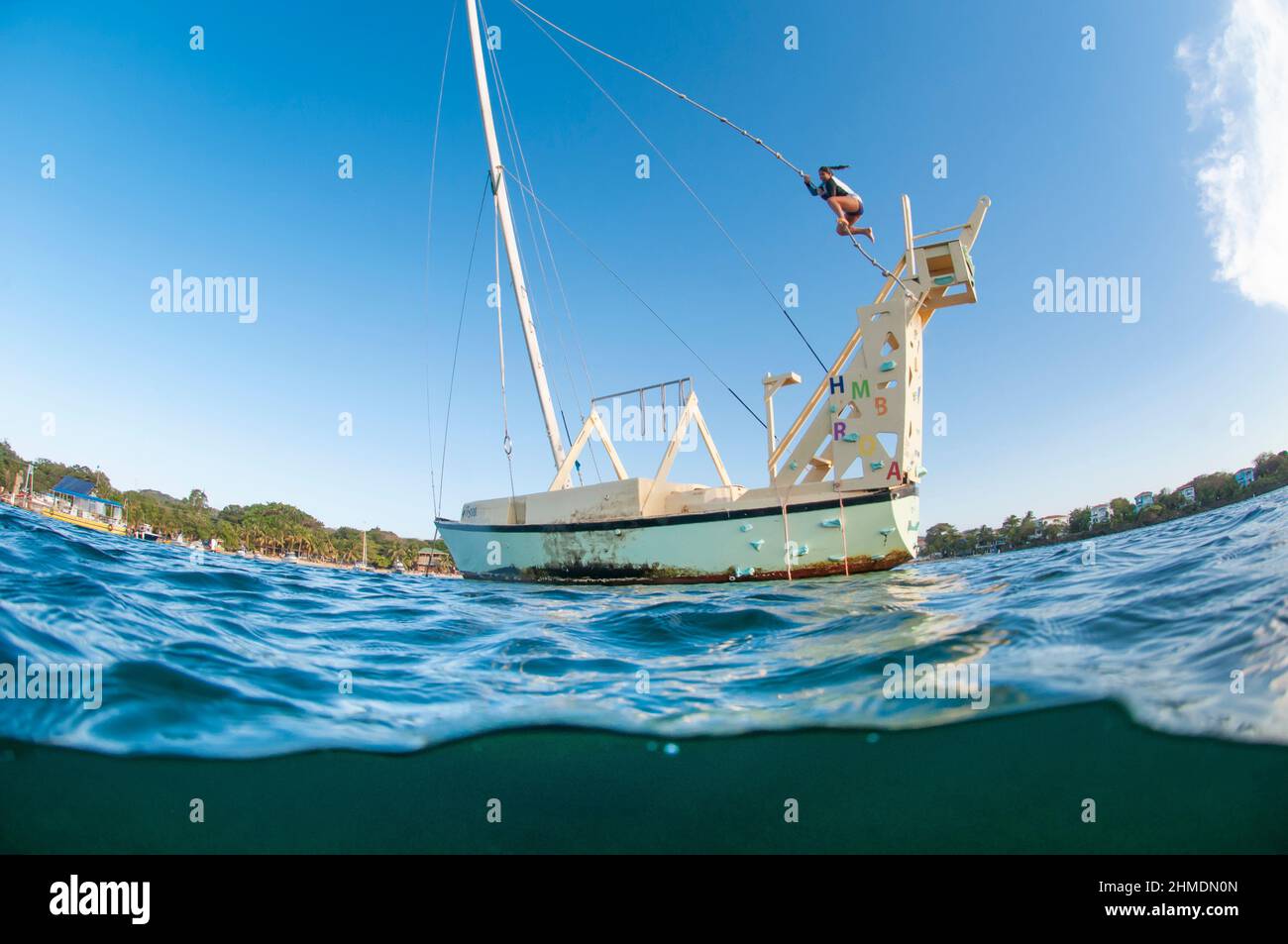 Girl jumping from a sailing boat Stock Photo - Alamy