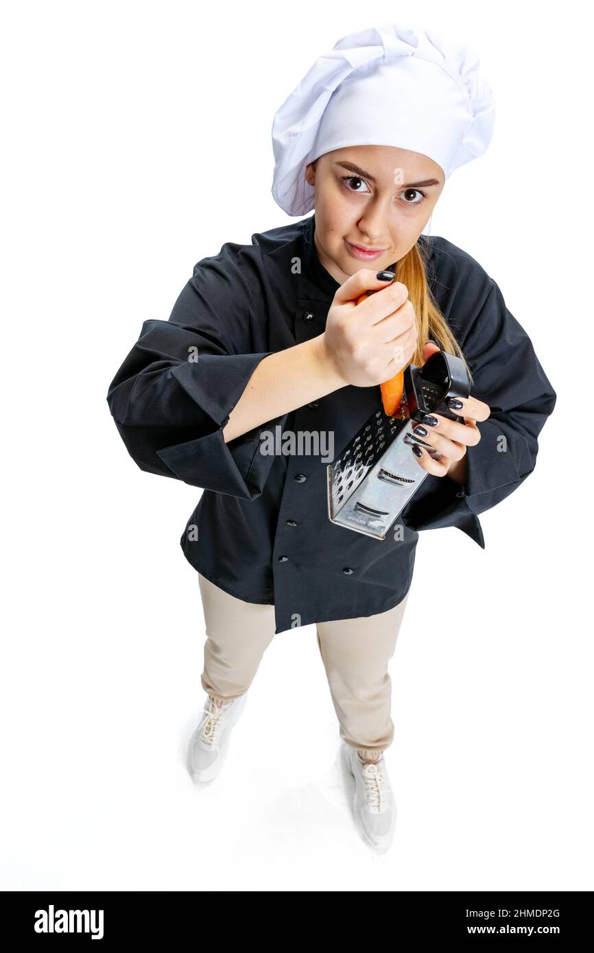 Beautiful lady cooking in kitchen Cut Out Stock Images & Pictures - Alamy