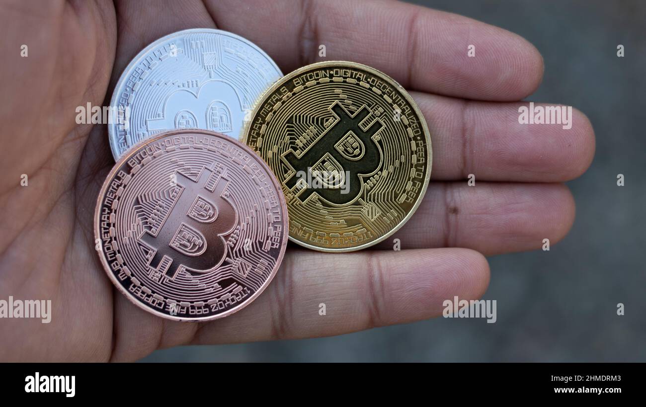 Gold, Silver and copper coins of bitcoins Stock Photo - Alamy