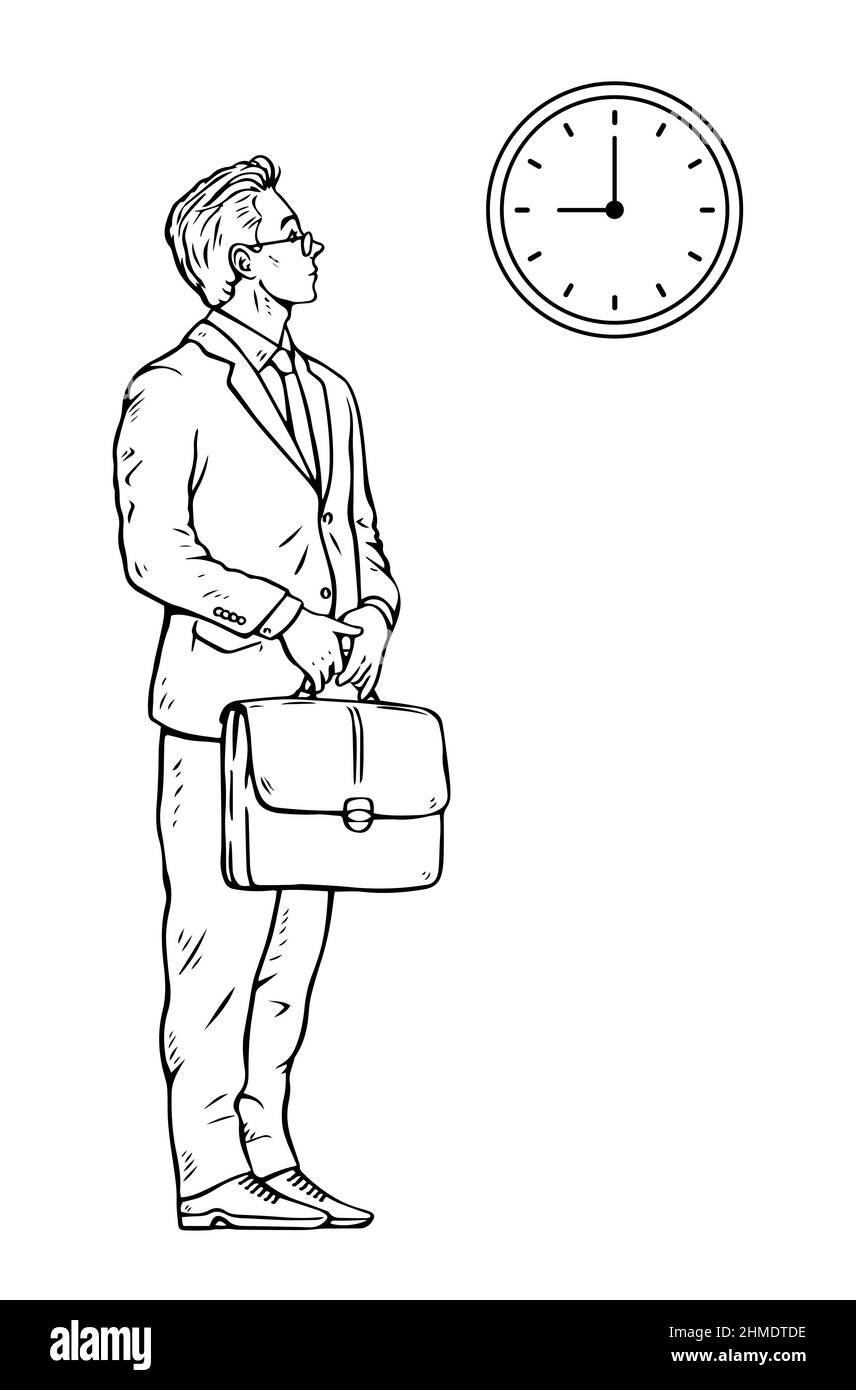 The young businessman is punctual in time. Standing in a business suit ...