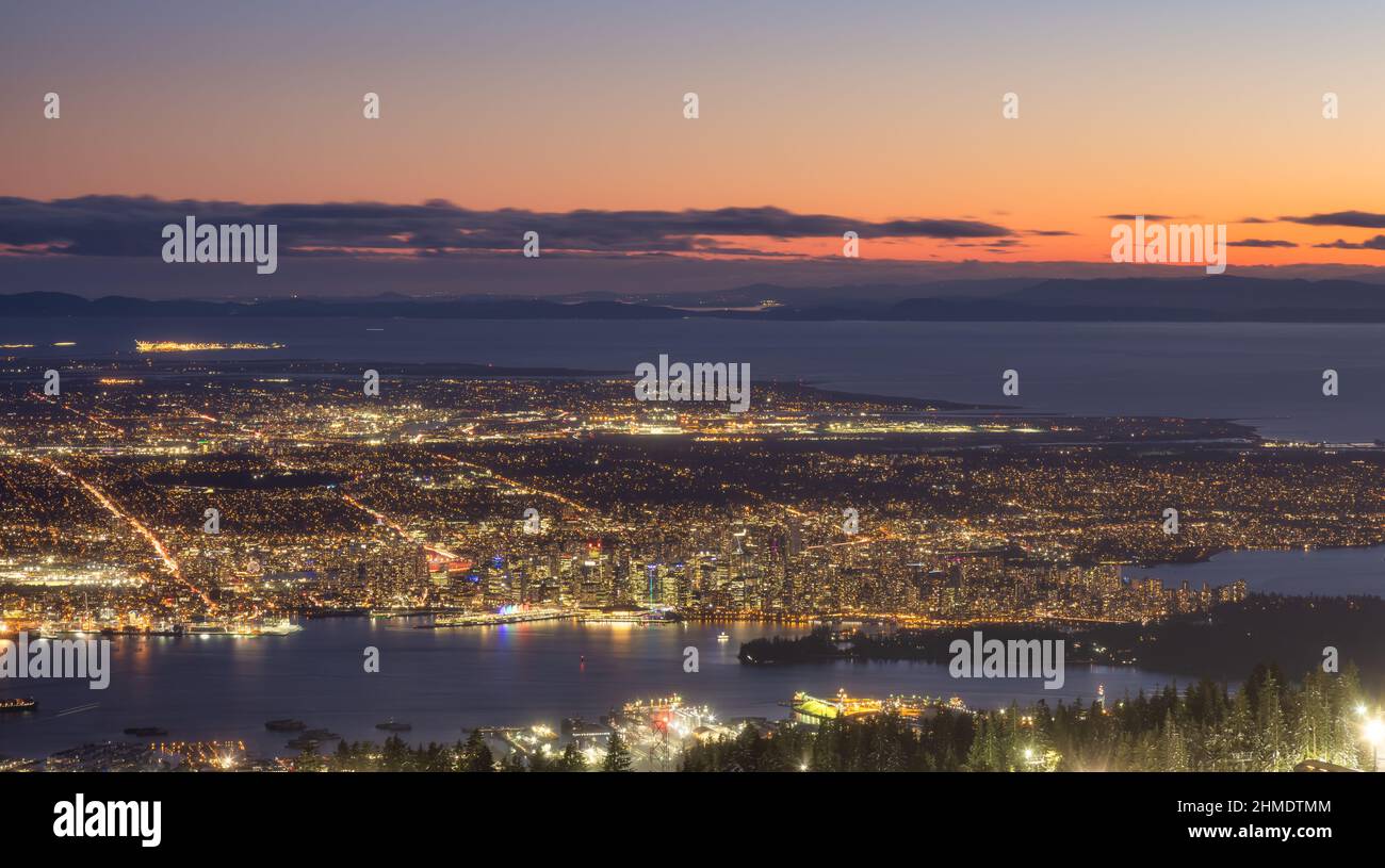 View of Top of Grouse Mountain Ski Resort with the City in the ...