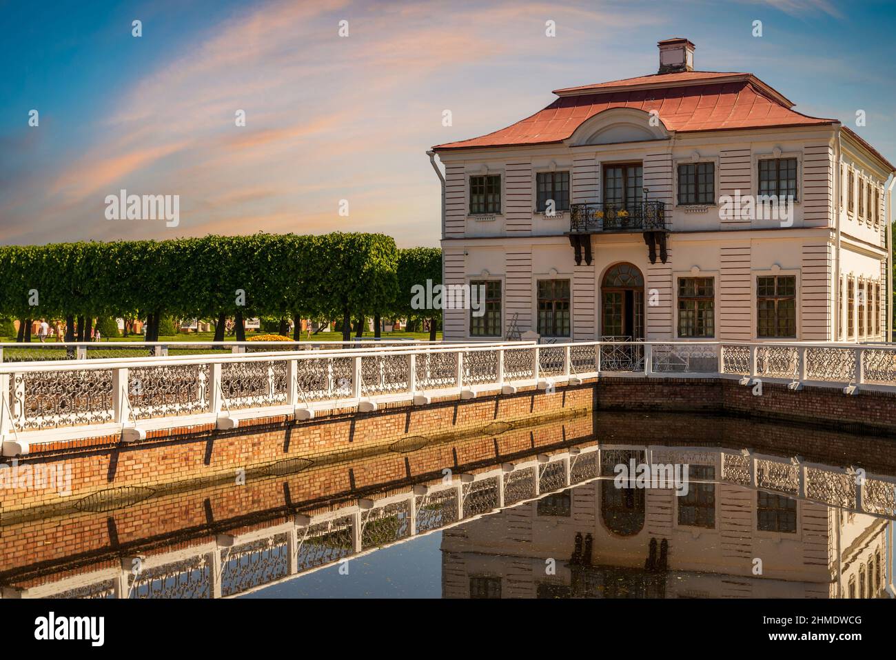 Marly palace and reflection in pond in the western path of Lower Park ...