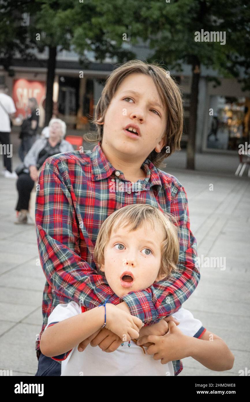 Children holding hands from behind hi-res stock photography and images ...