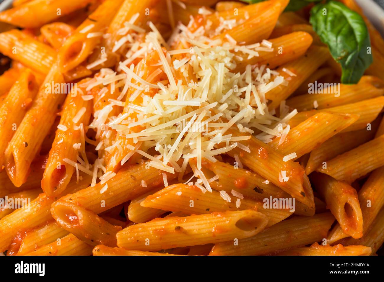 Homemade Penne Pasta with Marinara Sauce Cheese and Basil Stock Photo ...