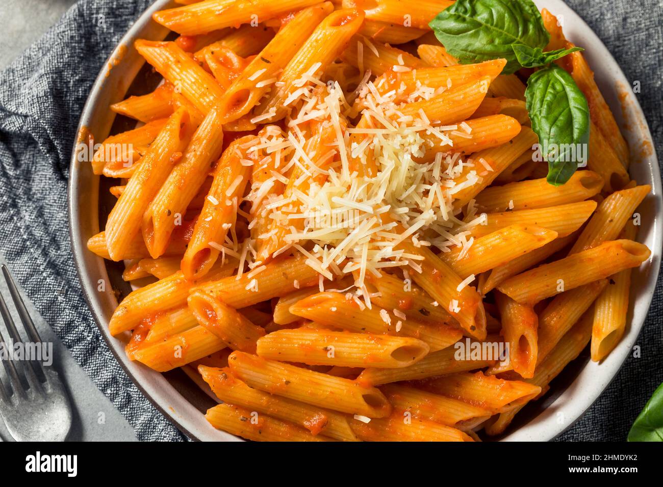 Homemade Penne Pasta with Marinara Sauce Cheese and Basil Stock Photo ...