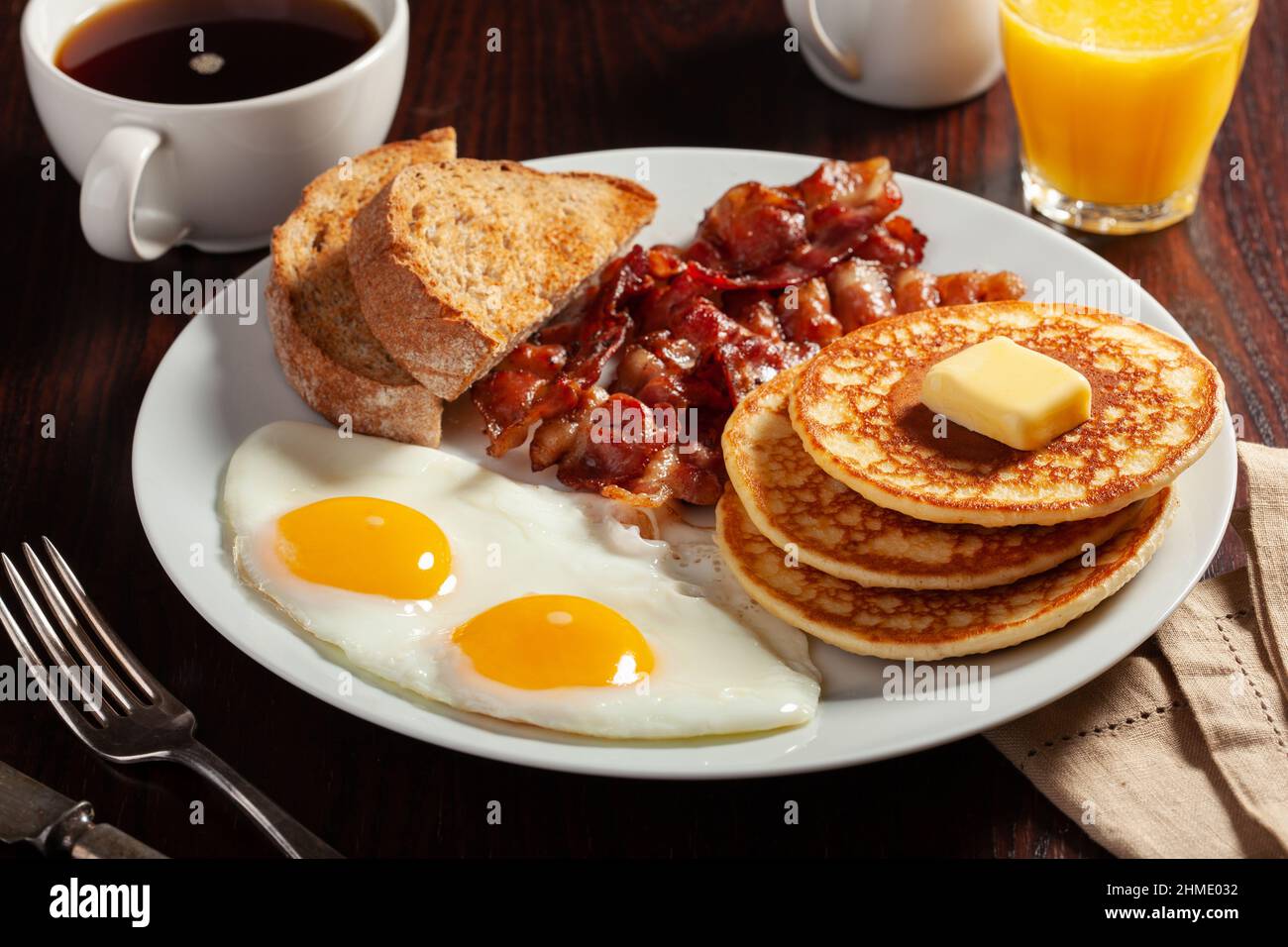 traditional full american breakfast eggs pancakes with bacon and toast ...