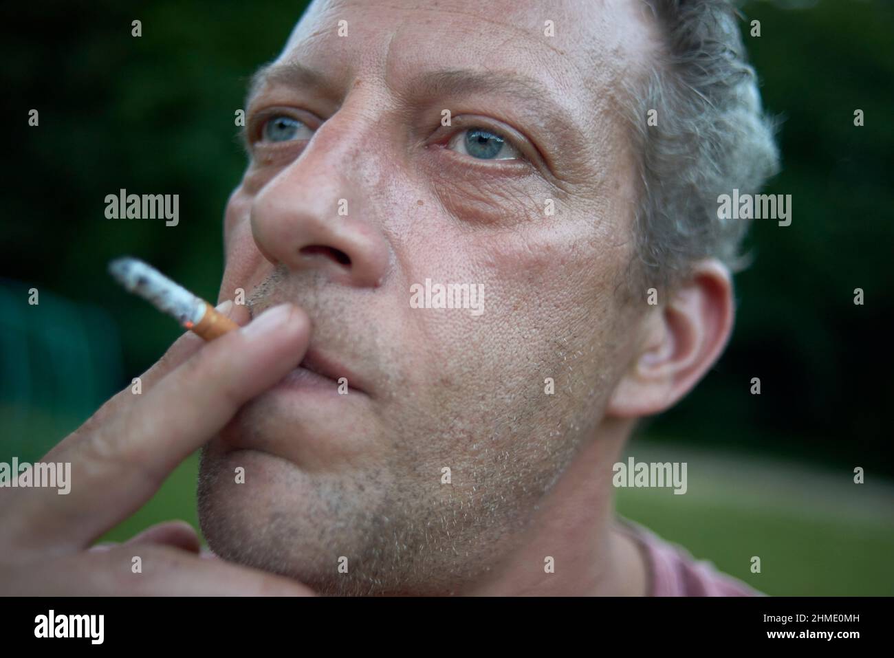 Man relaxing smoking cigarette car hi-res stock photography and images ...