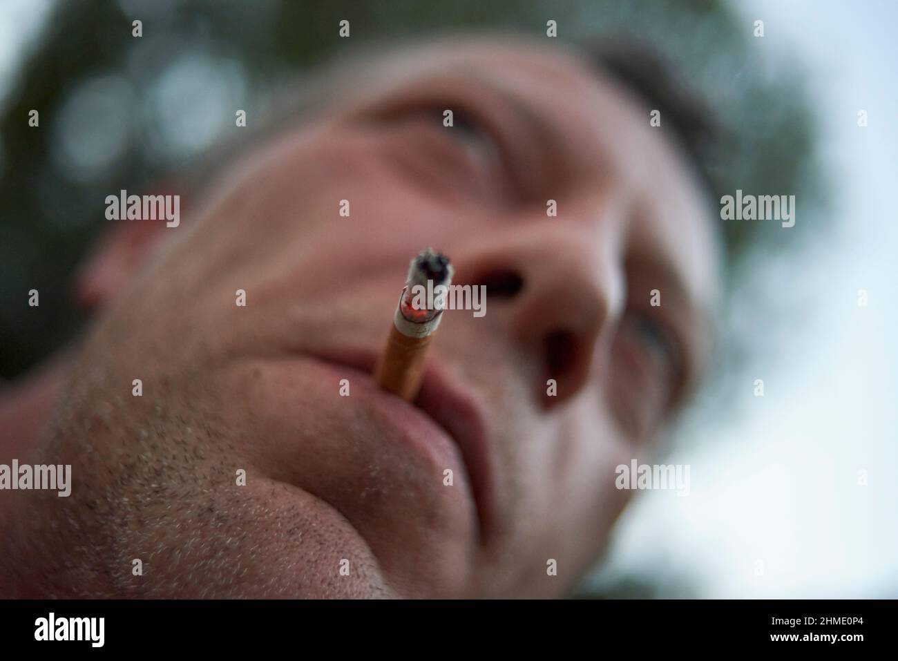 ''aged man mouth cigarette smoke'' hi-res stock photography and images ...