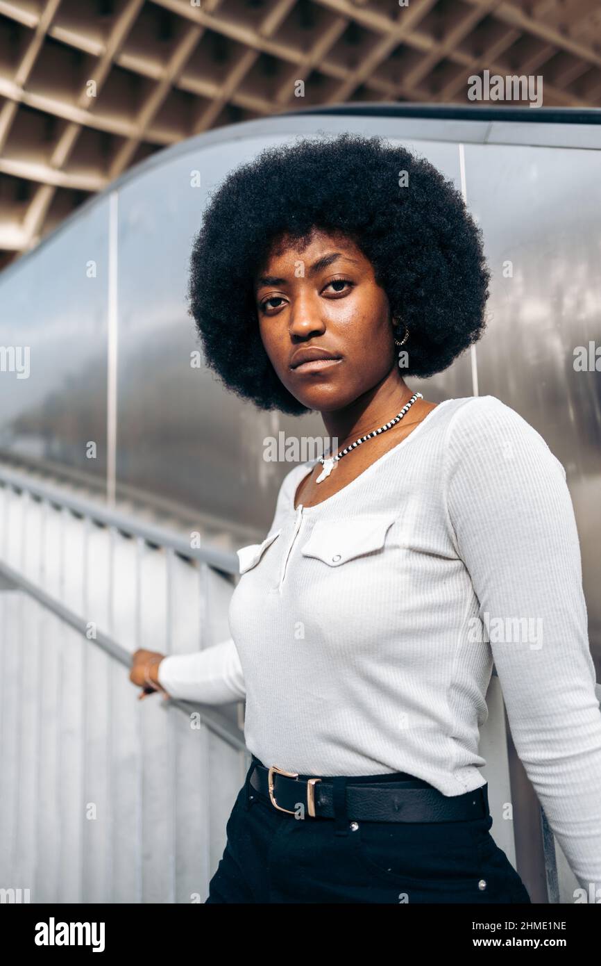 Woman up a ladder outside hi-res stock photography and images - Alamy