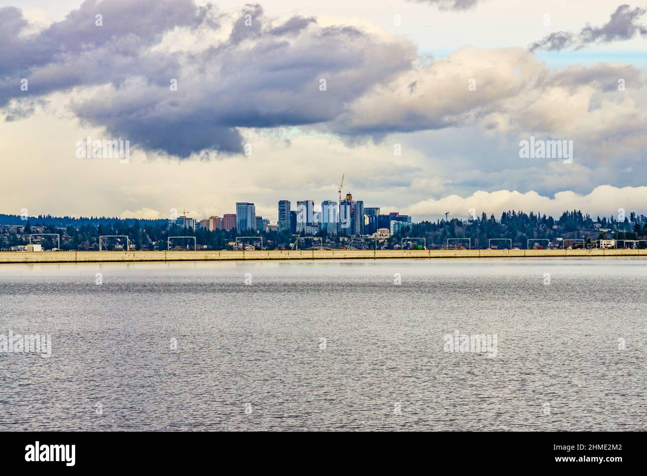 Clouds hover over a bridge on Lake Washington in Seattle Stock Photo ...