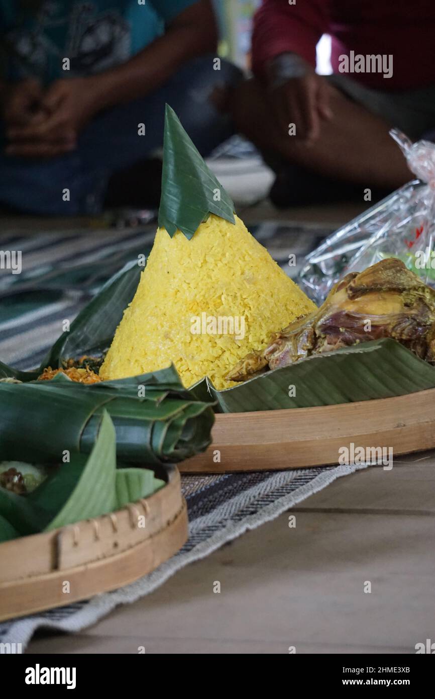 Indonesian thanksgiving menu that called nasi tumpeng (rice with cone ...