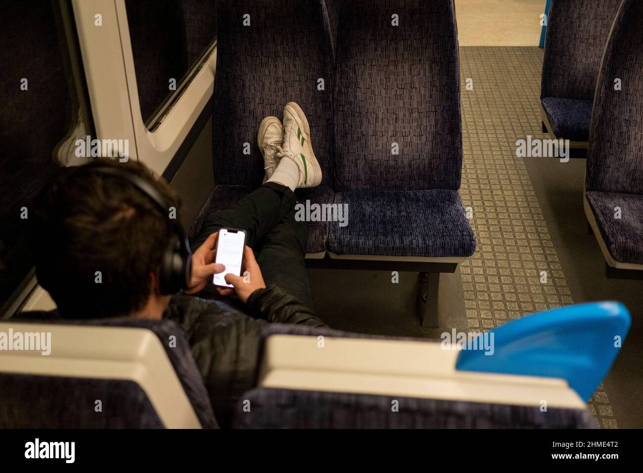 Shoes on train seat hi-res stock photography and images - Alamy