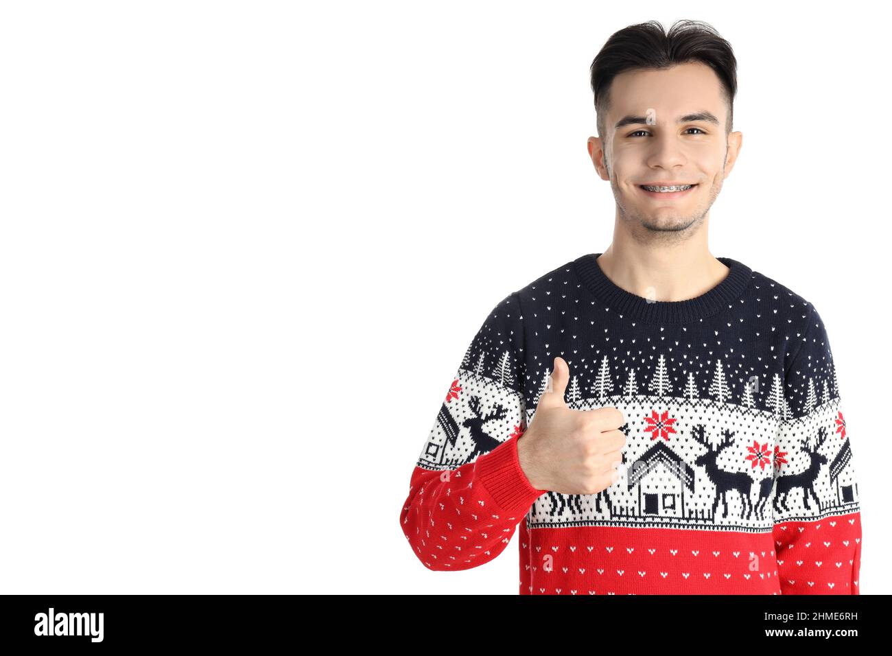 Attractive guy in sweater isolated on white background Stock Photo - Alamy