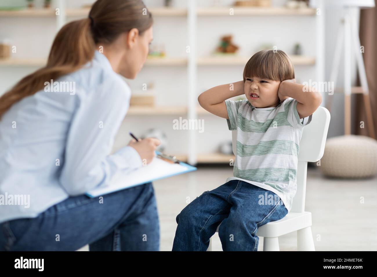 Professional psychotherapist trying to talk to difficult kid, grumpy ...