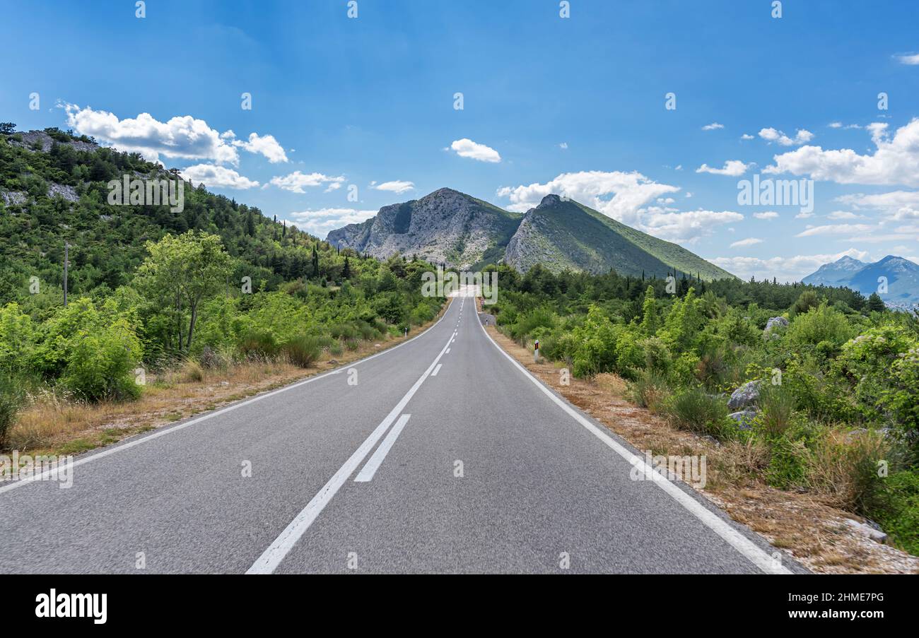 Scenic road. Road is surrounded by a magnificent natural landscape ...
