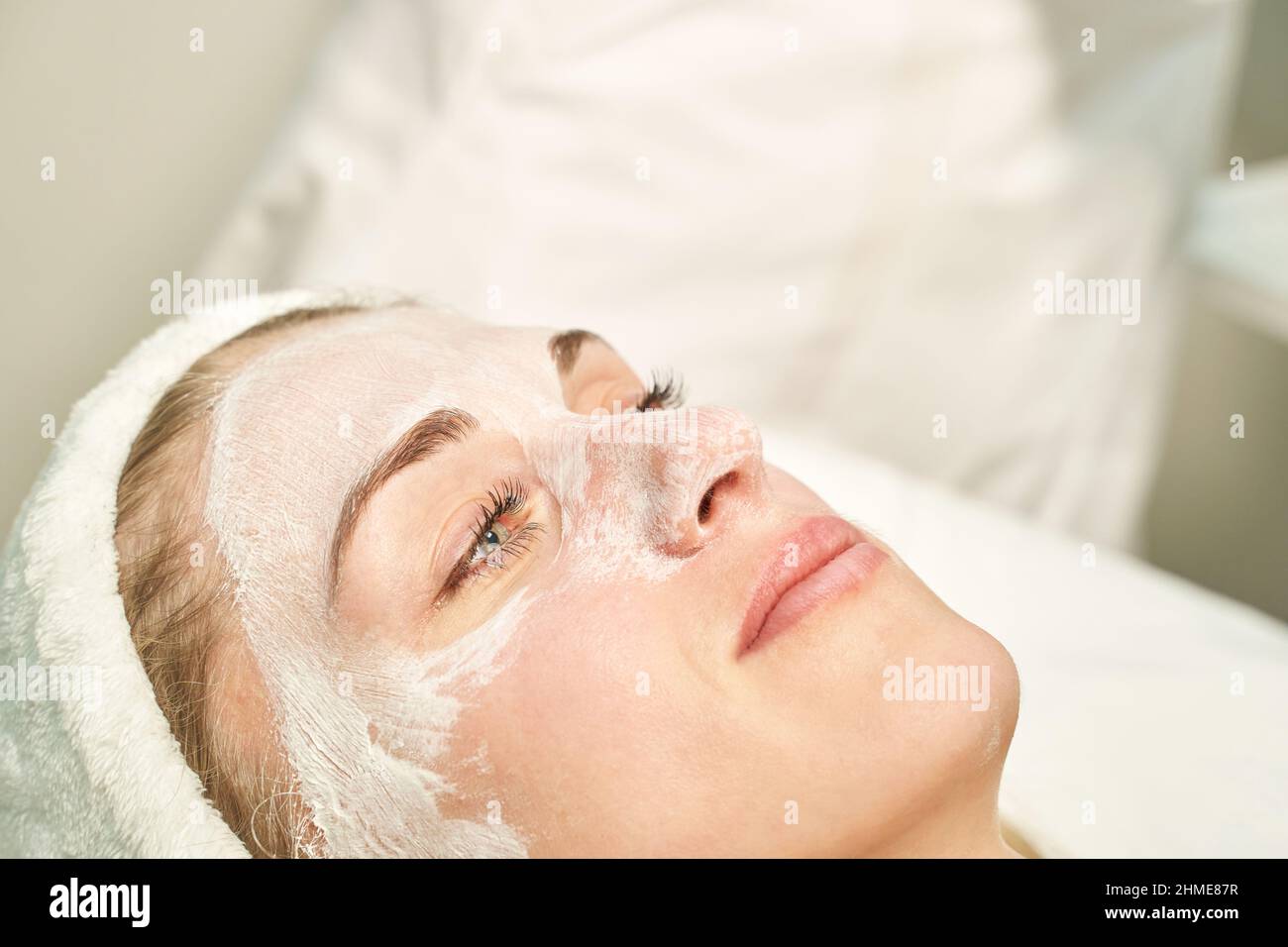 Face massage prepare at spa salon. Doctor hands. Pretty female patient ...