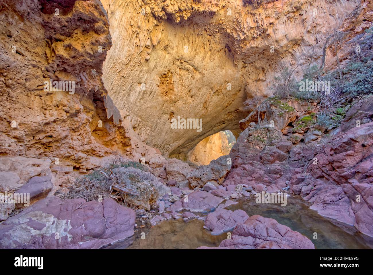 Entrance to the arch beneath the Tonto Natural Bridge Arizona. Pine ...