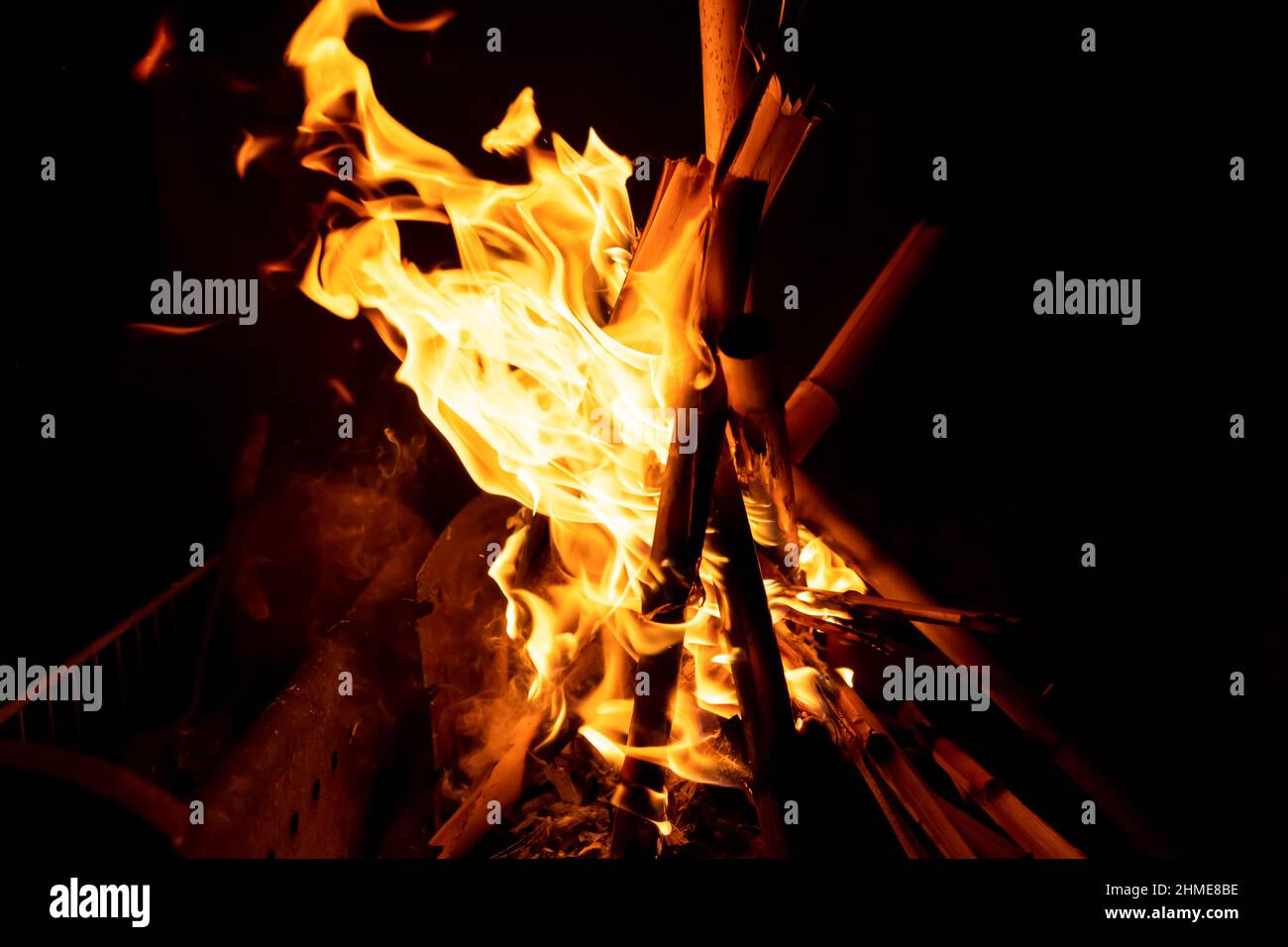 Beautiful formation of fire created by burning some dry reeds forming ...