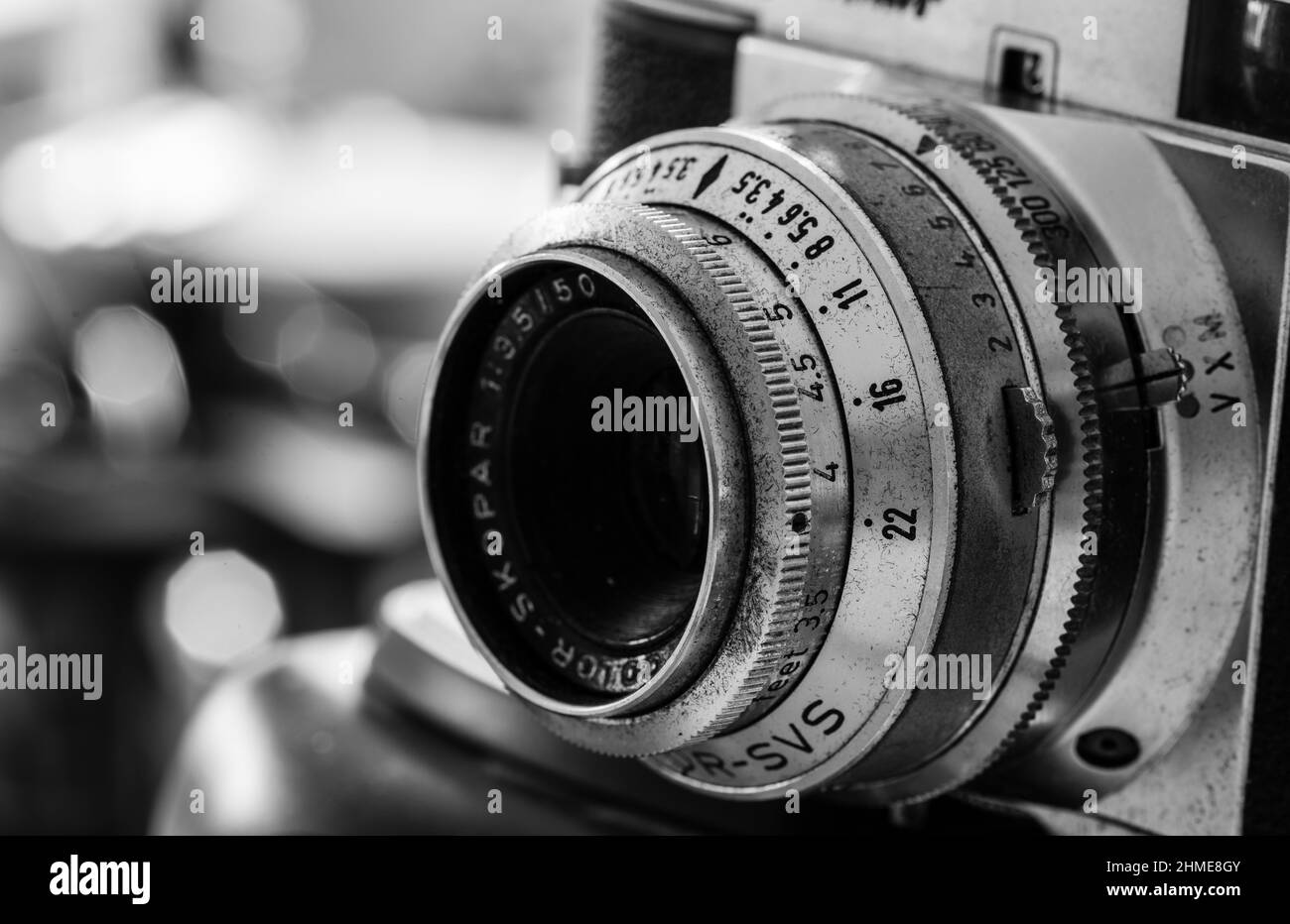 vintage film camera lens with shutter speed and aperture adjustments on ...