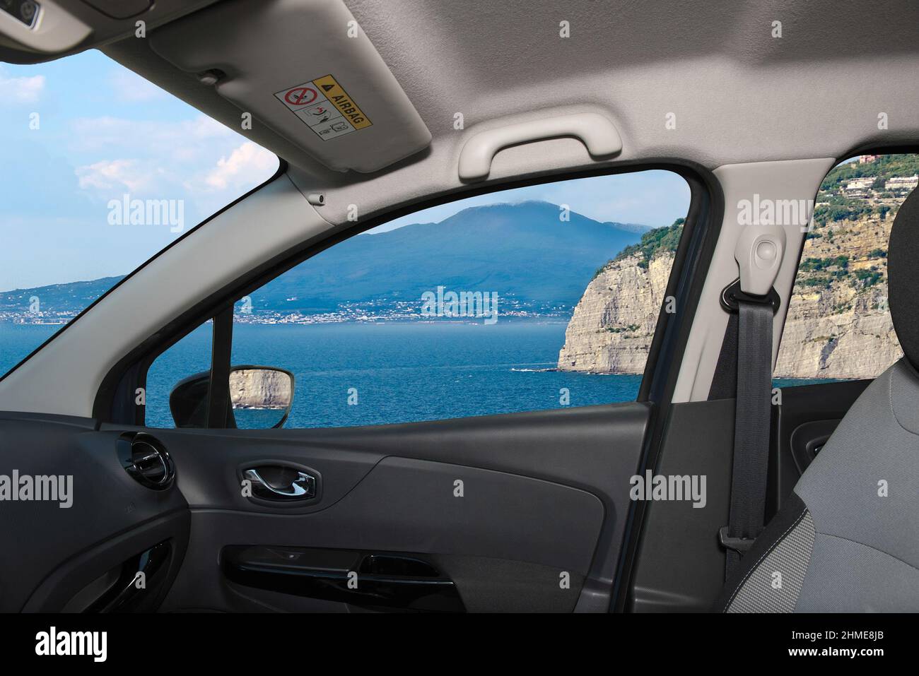 Looking through a car window with view of the iconic volcano Vesuvius ...