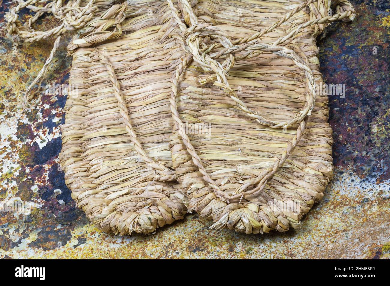 Traditional Japanese Samurai Waraji straw sandals on rusty background ...