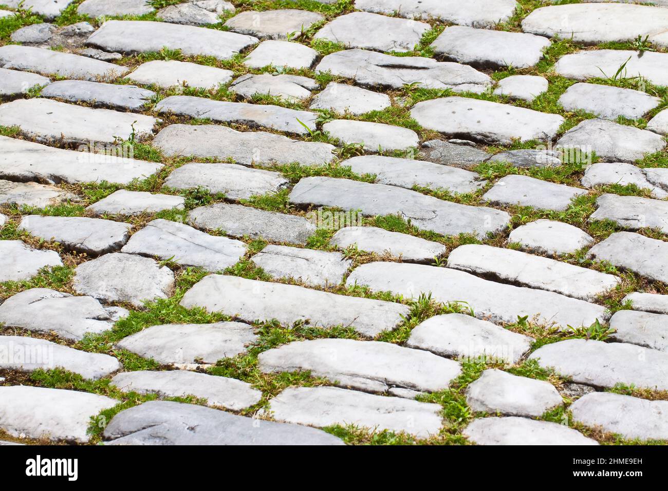 Typical italian paving made with of white marble stone blocks Stock ...