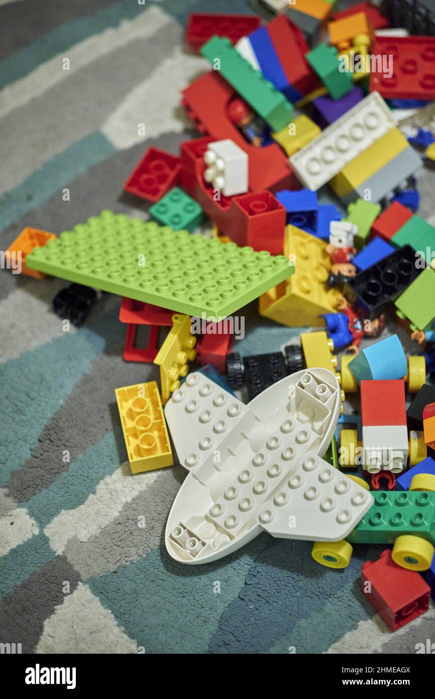 Lego Duplo blocks on a floor Stock Photo - Alamy
