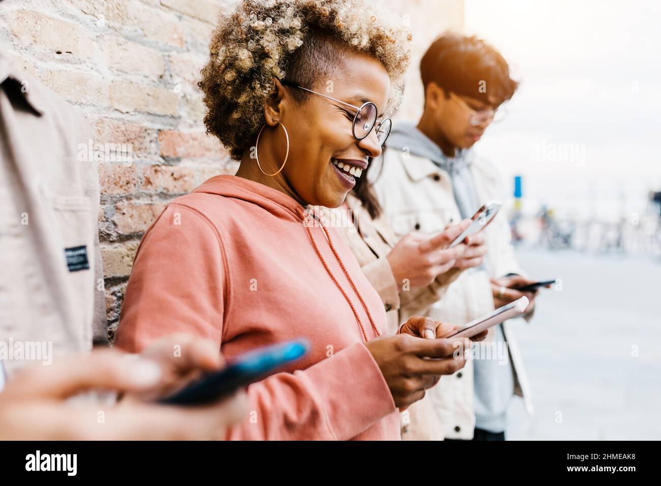 Mobile happy hi-res stock photography and images - Alamy