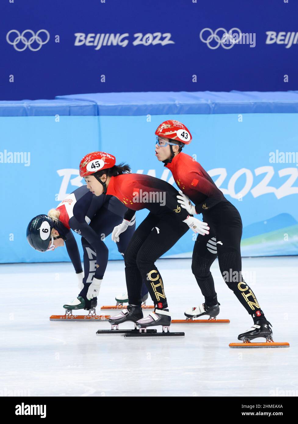 Beijing, China. 9th Feb, 2022. Zhang Yuting (C) and Fan Kexin (R) of ...