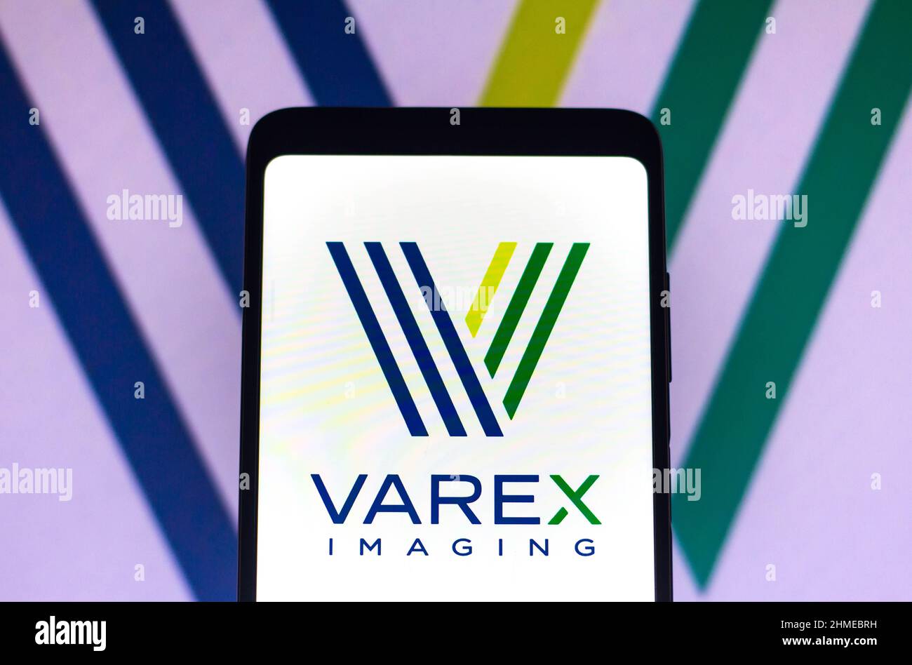 In this photo illustration the Varex Imaging Corporation logo seen displayed on a smartphone and ...