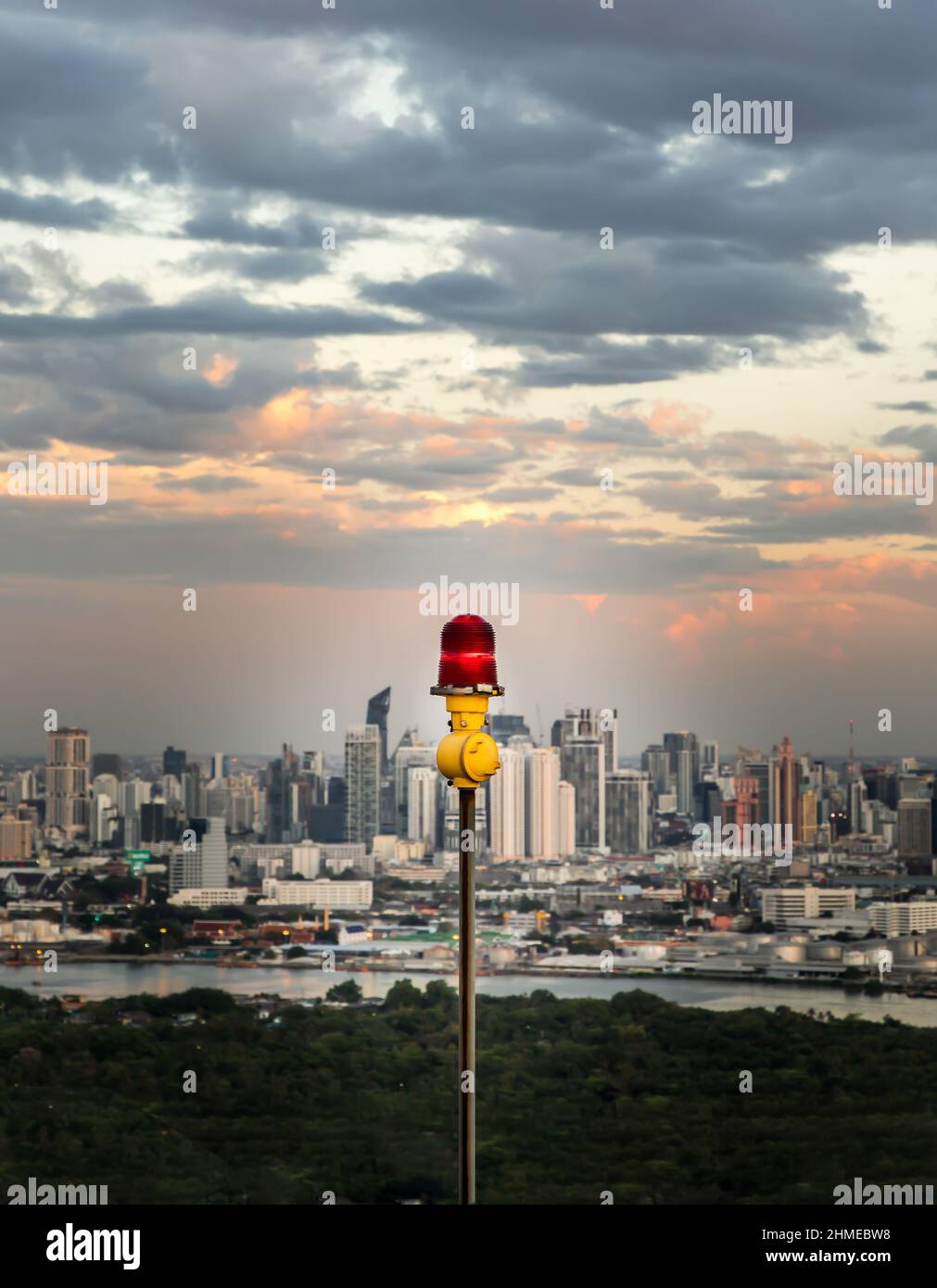Red lantern of obstruction lights mounted on the rooftop of high rise ...