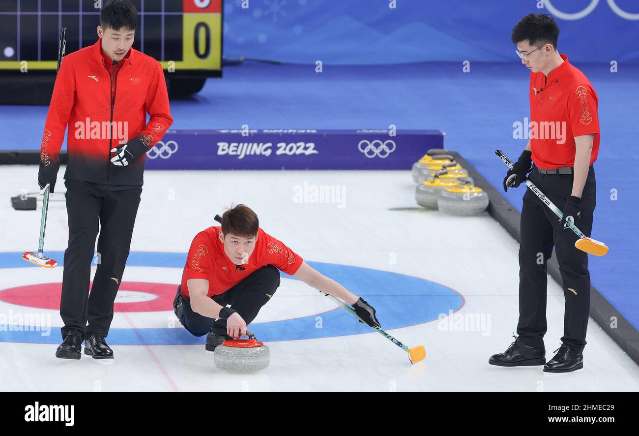 Beijing, China. 9th Feb, 2022. China's Zou Qiang, Wang Zhiyu and Xu ...