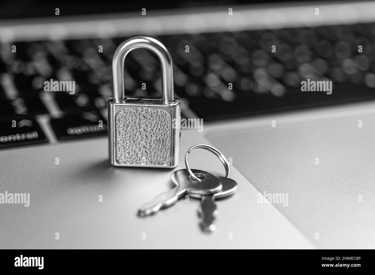 Computer security concept. Padlock on computer keyboard, laptop in ...