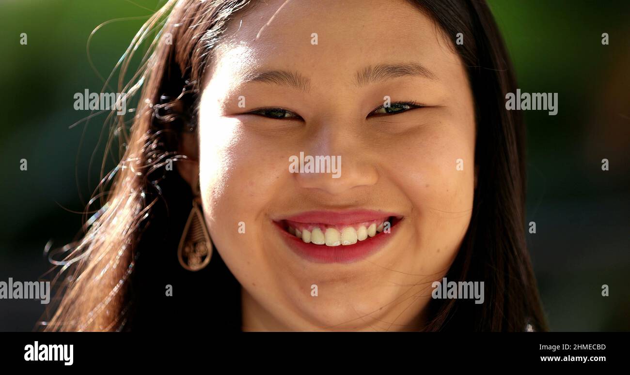 Happy Asian woman portrait face close-up smiling to camera Stock Photo ...