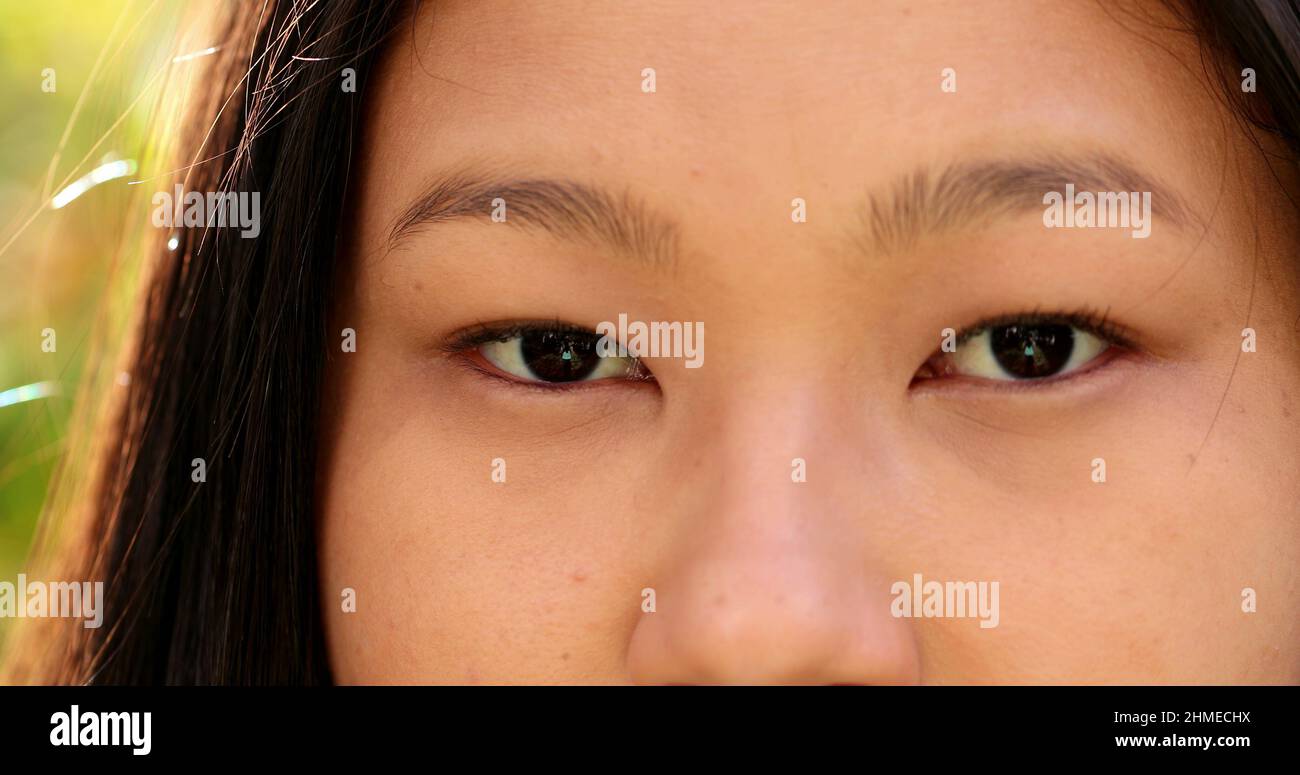 Japanese descent young Asian woman eyes close-up Stock Photo - Alamy