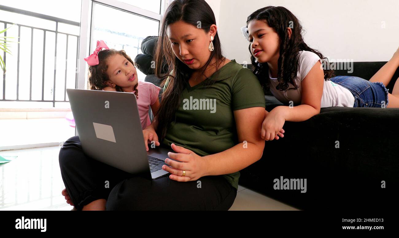 Mother parenting and working at the same time, mom multi-tasking ...